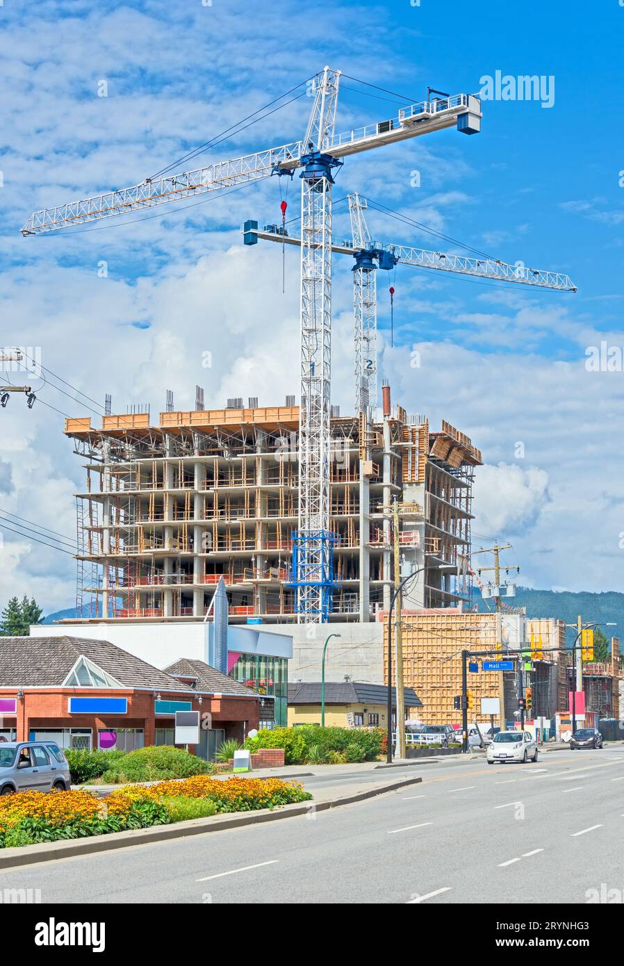 Construction of concrete high rise residential building Stock Photo - Alamy