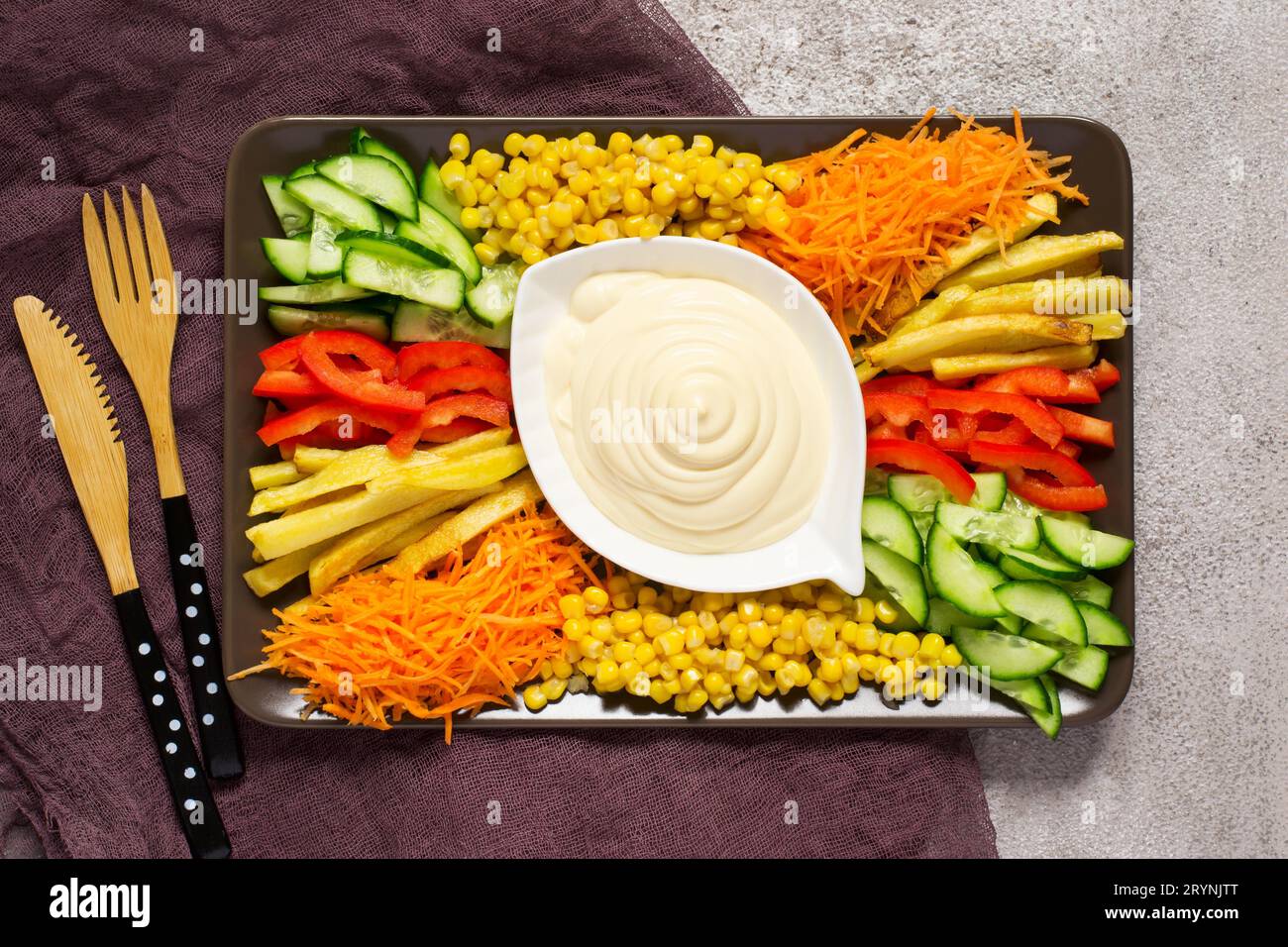 Homemade mayonnaise sauce. Dish with set of colorful vegetables Stock ...