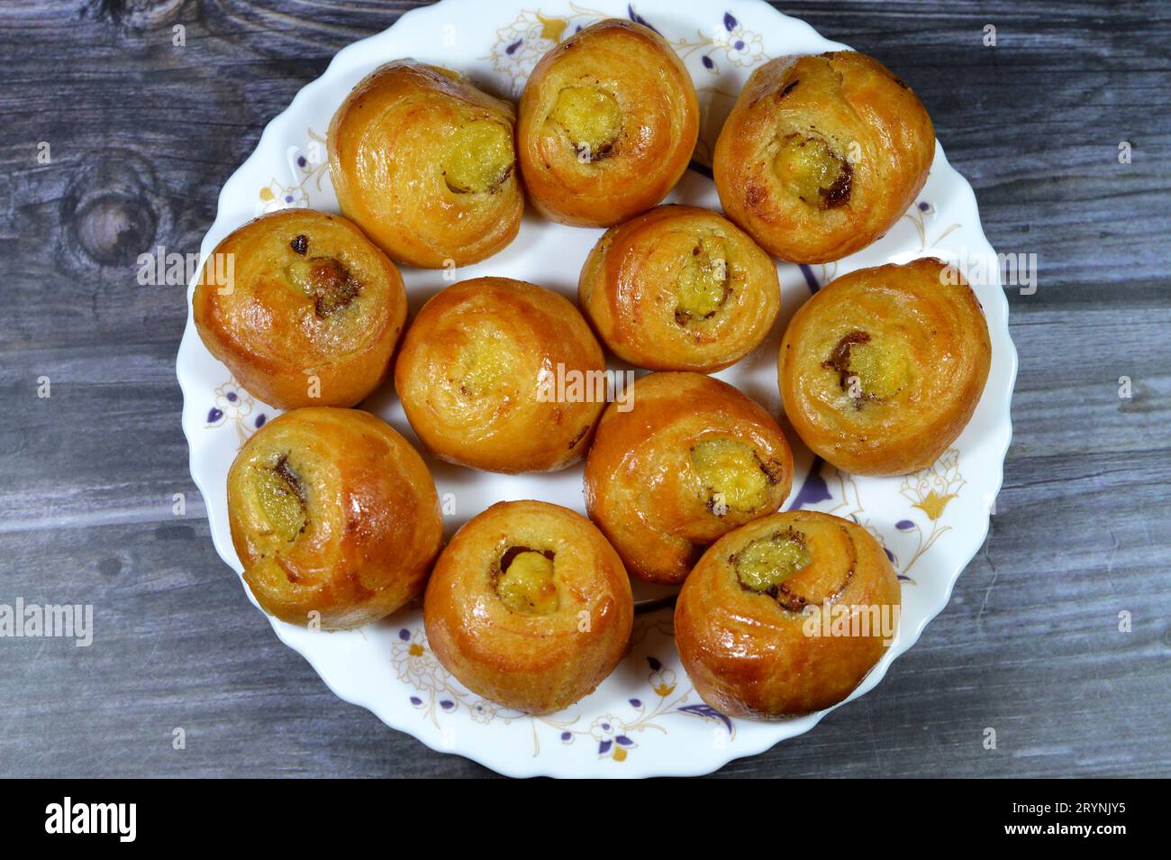 Mini Cinnamon swirl puff roll sweetened with honey and raisins and ...