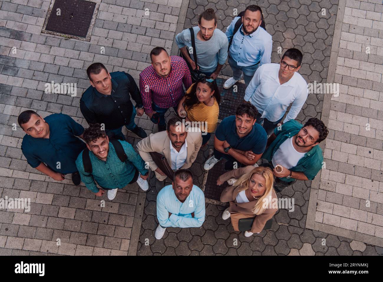 A top view photo of group of businessmen and colleagues standing ...