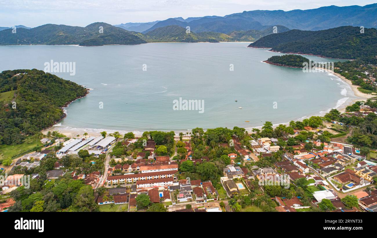 Aerial view of town and Praia do Lazaro (Lazaro beach) with sky ...
