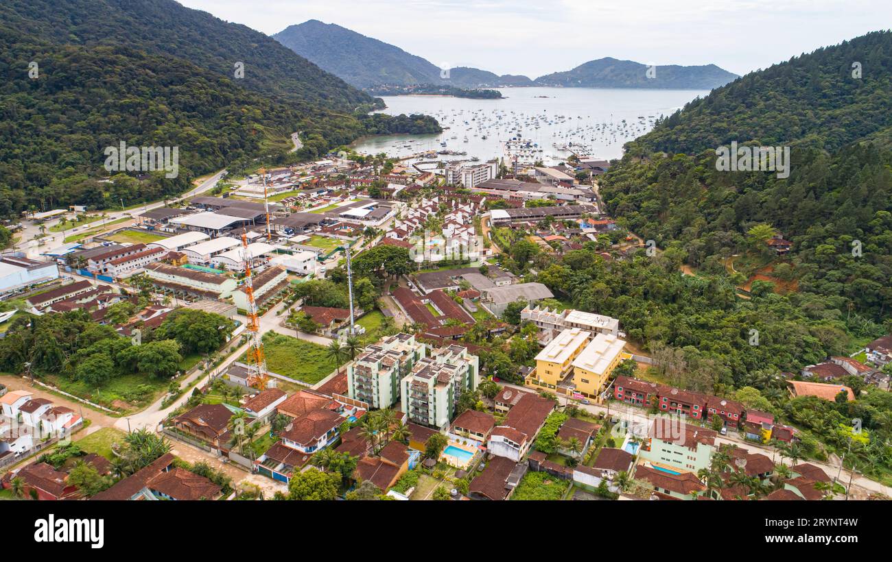Aerial view of town and Praia do Lazaro (Lazaro beach) with sky ...