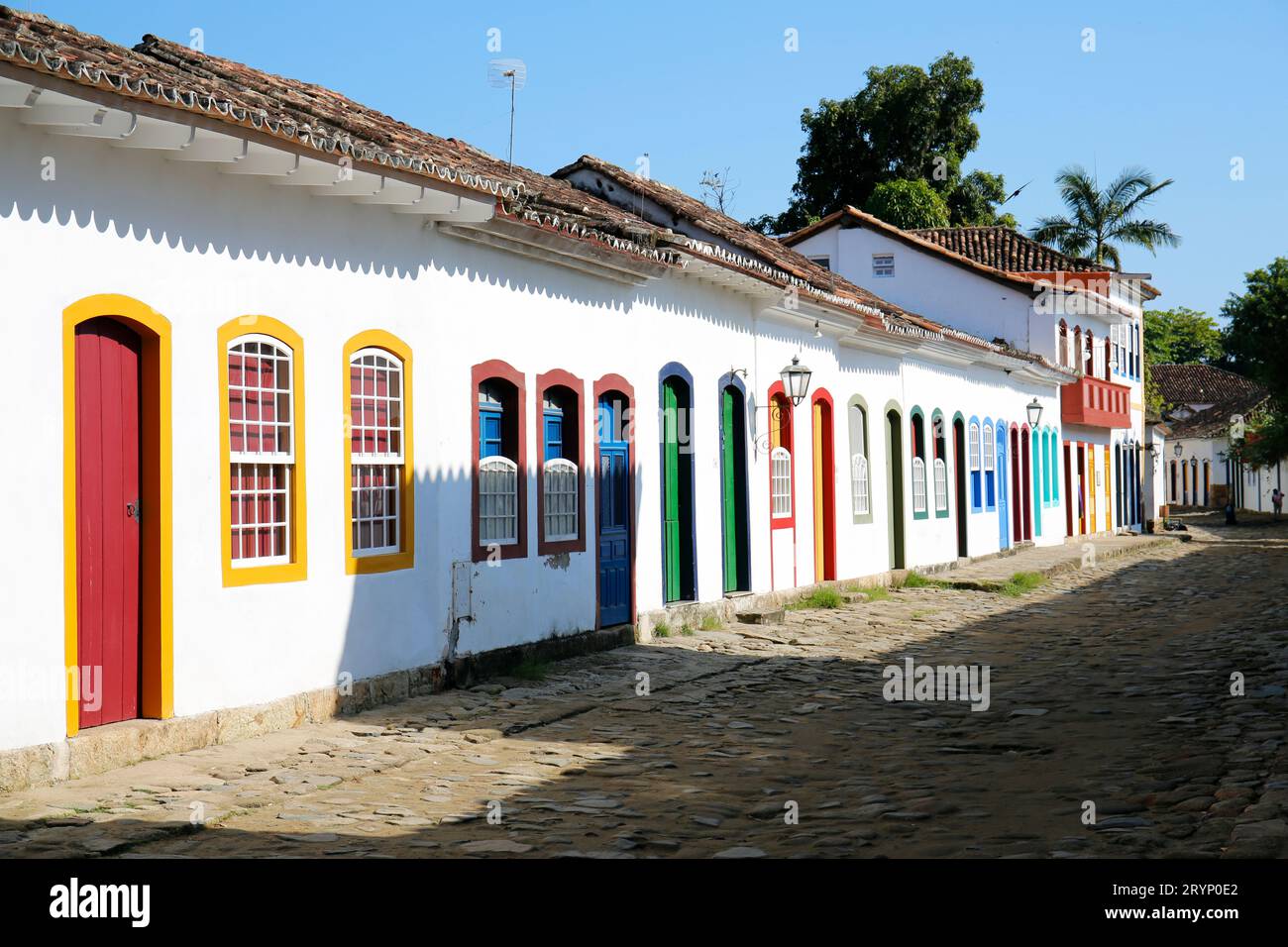 Typical house facades with colorful doors and windows in historic town ...