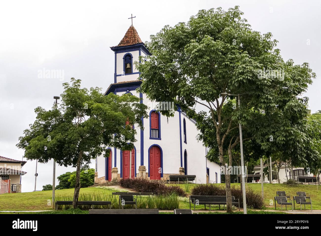 Colonial church framed by trees and cloudy background, Santa Barbara ...