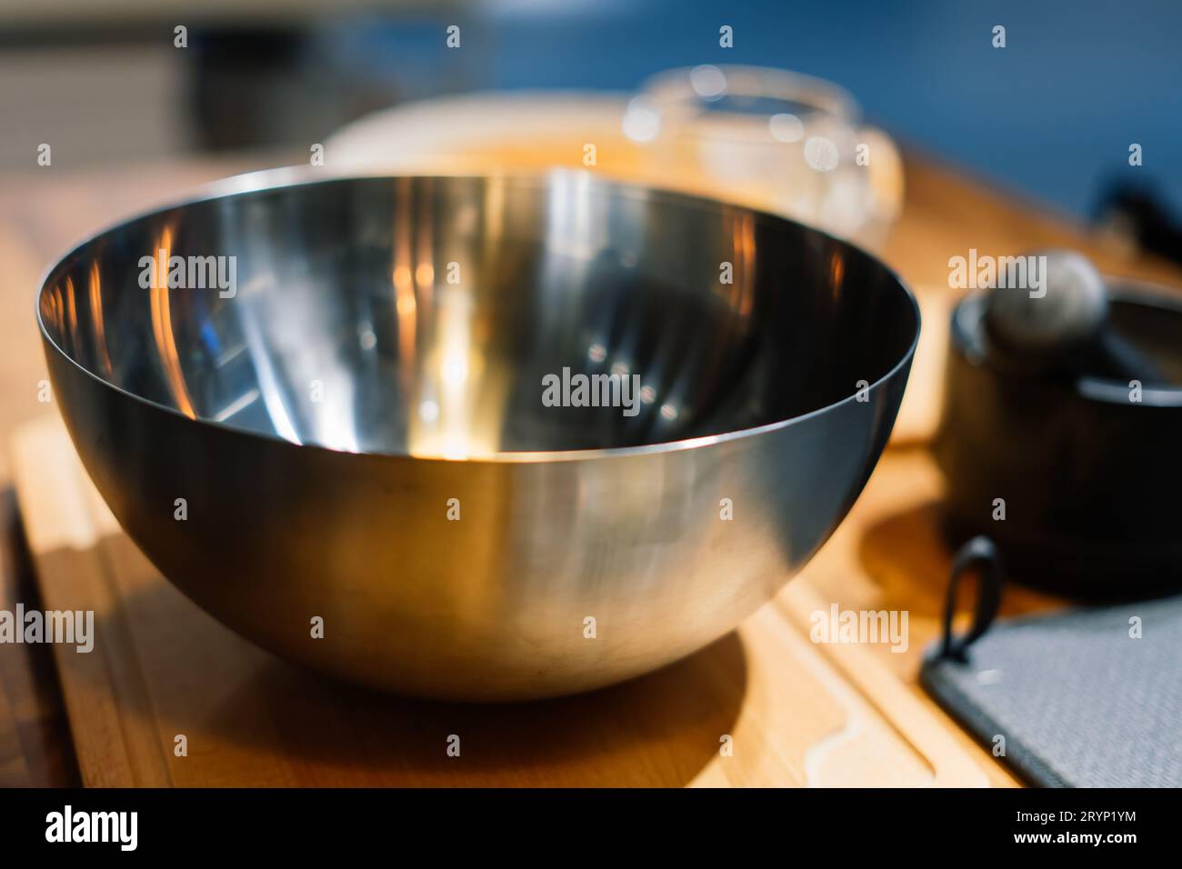Wooden kitchen utensils stacked view, spoons, bowls, plates Stock Photo ...
