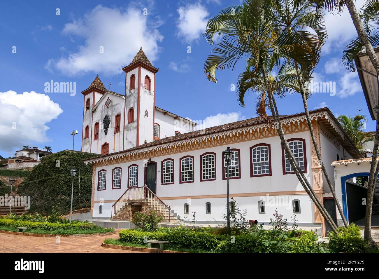 Wonderful decorated colonial building and a church in background at ...