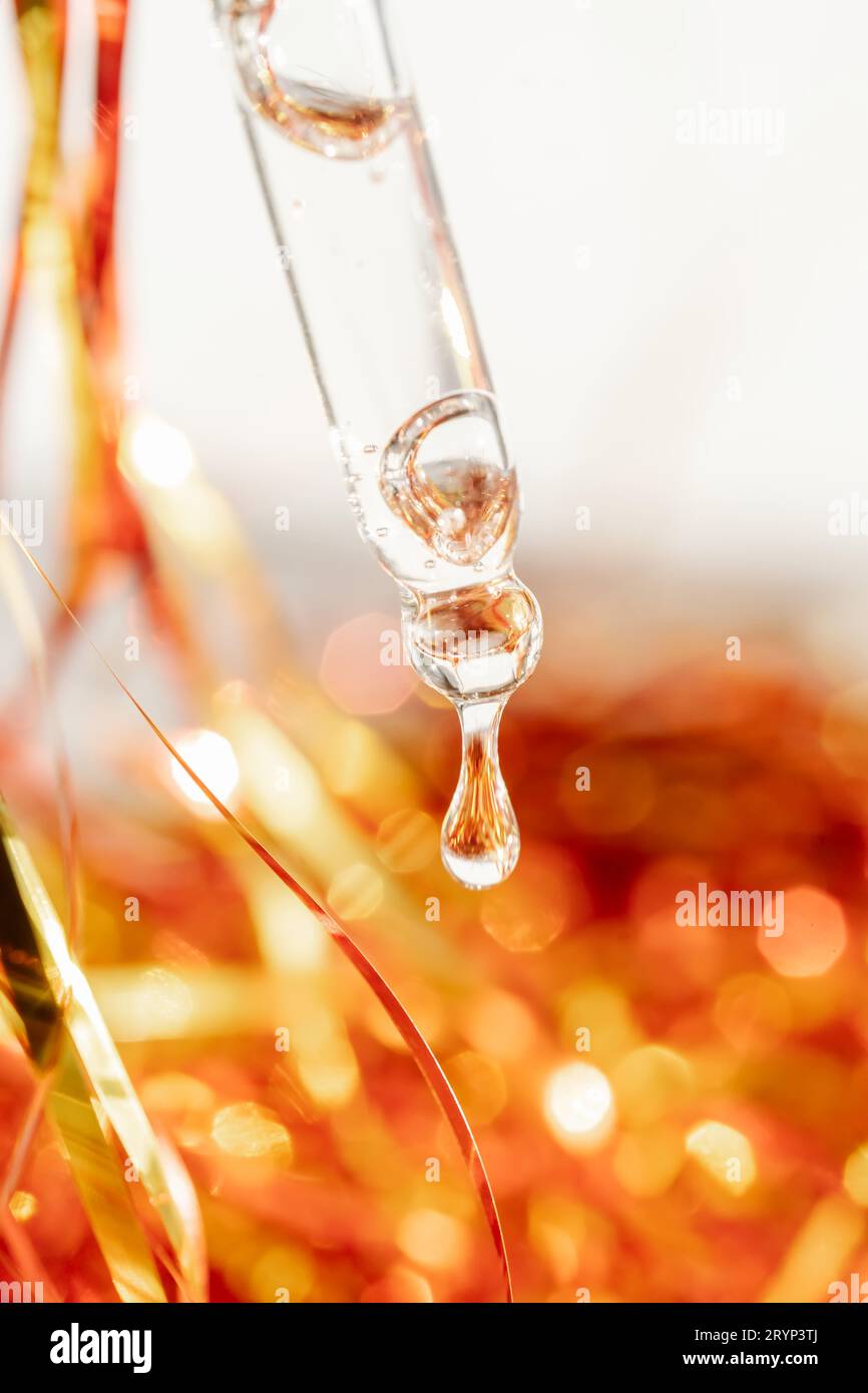 Yellow pipette transparent drops hi-res stock photography and images ...