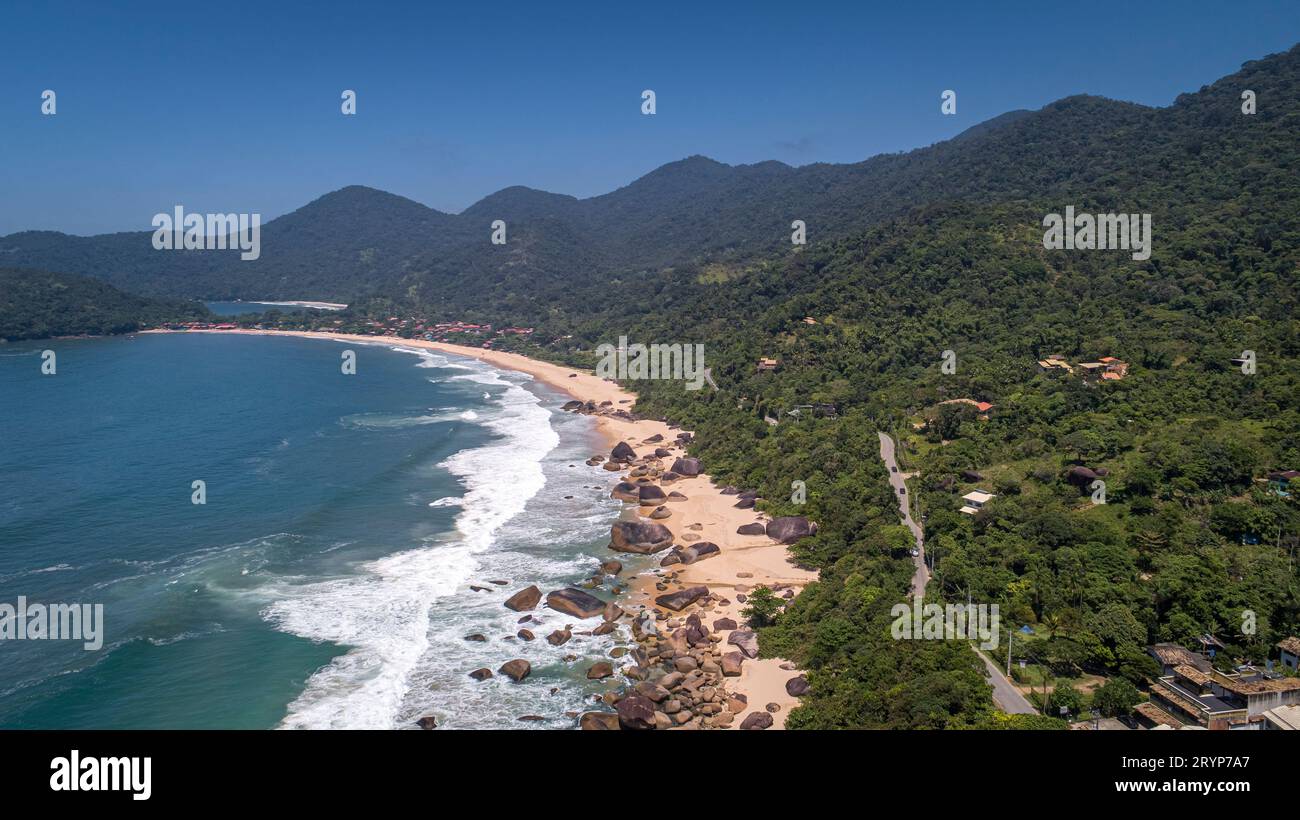 Aerial view to wonderful Green Coast shoreline and mountains covered ...