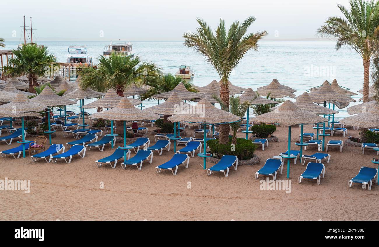 Empty beach umbrellas in egypt hi-res stock photography and images - Alamy
