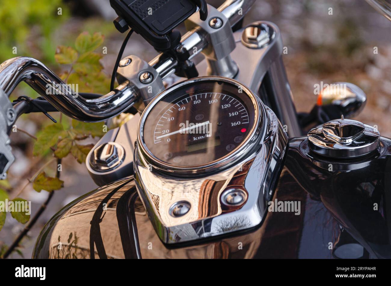 Handlebar and speedometer of classic chopper motorcycle close up Stock ...