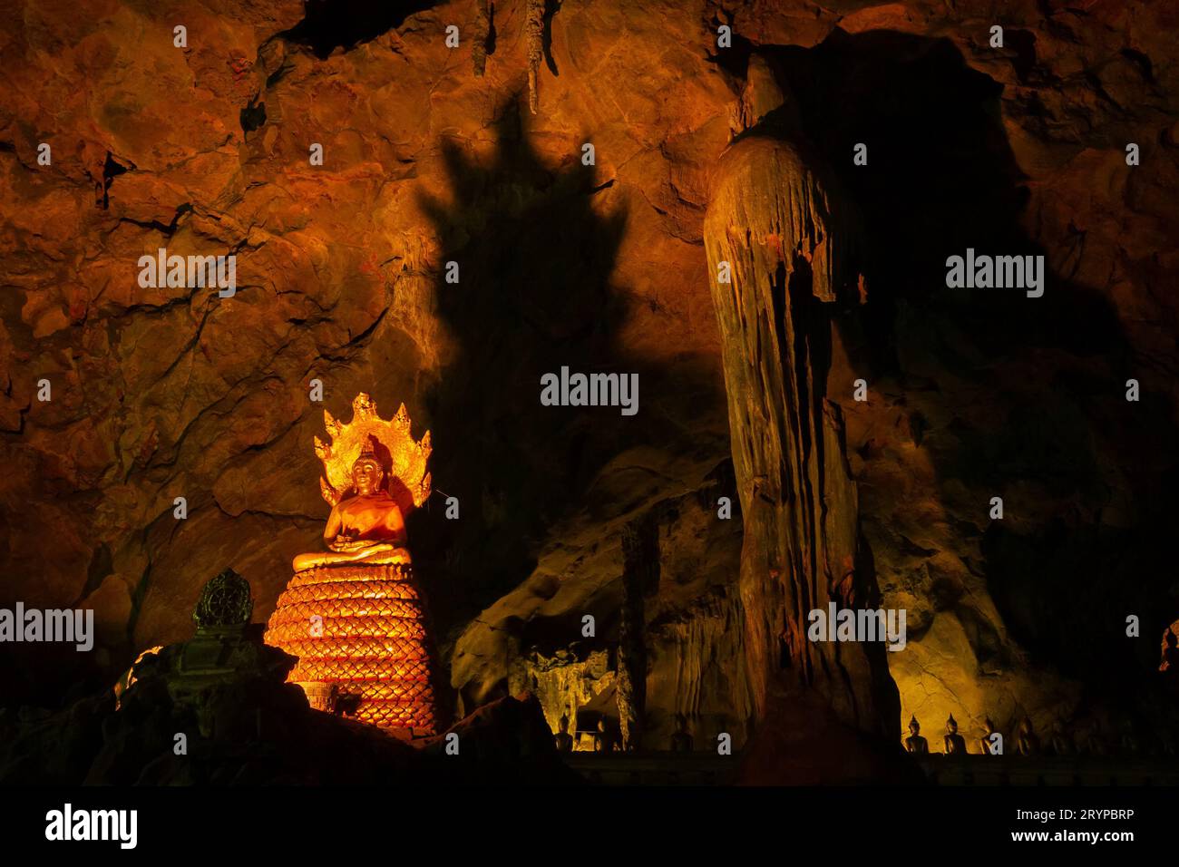 Meditating Buddha statue with naga snake (multi-headed king cobra ...