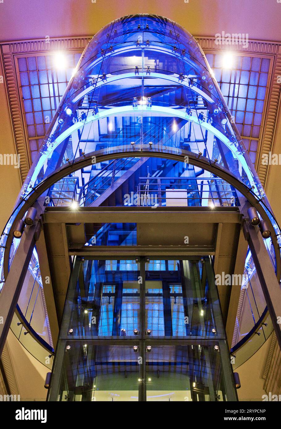 Blue illuminated elevator in the cross platform hall seen from the ...