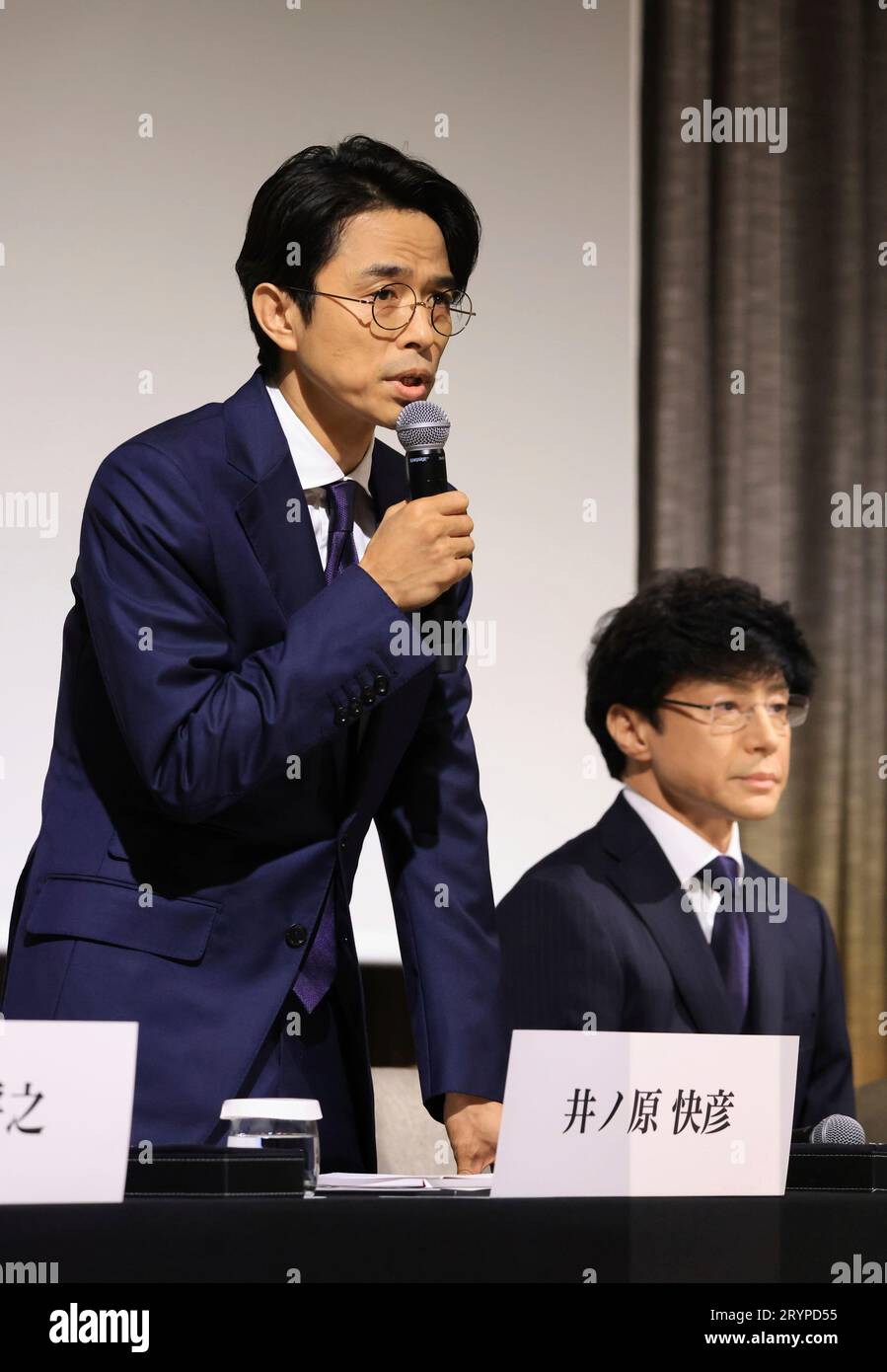 Yoshihiko Inohara (L), president of Johnny's Island, Inc.speaks at a ...