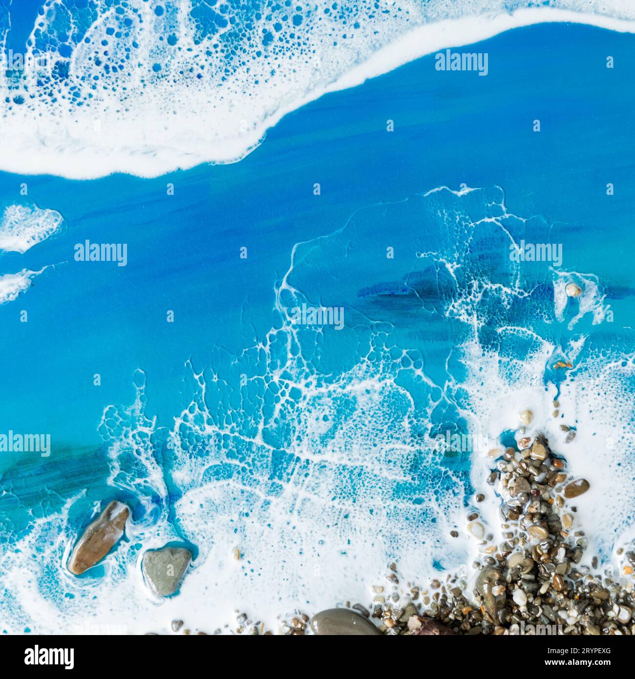 Resin art painting with blue ocean waves and stone beach. Epoxy art ...