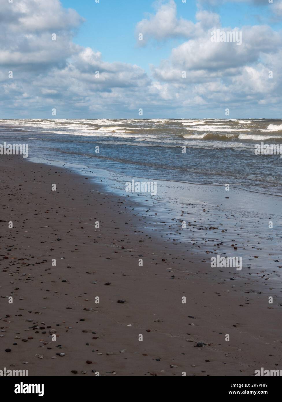 sea waves sand beach with pebbels windy ocean Stock Photo - Alamy