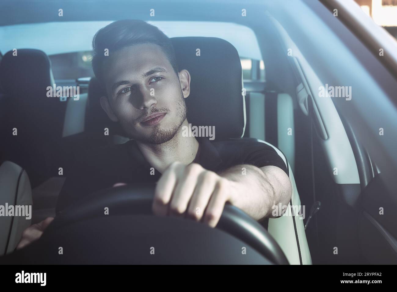 Modern car driving caucasian men hi-res stock photography and images ...