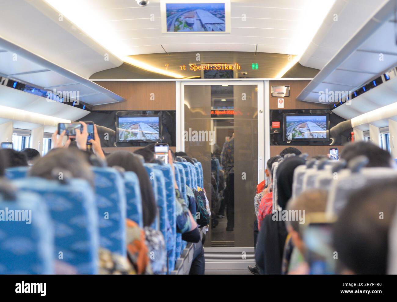 Jakarta. 2nd Oct, 2023. Passengers aboard a high-speed electric ...