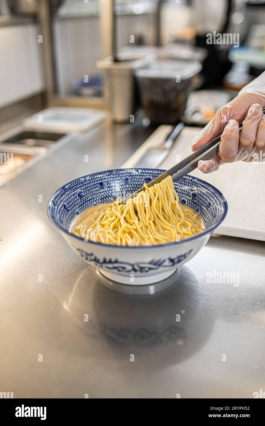 Chef making japanese ramen noodle soup Stock Photo - Alamy