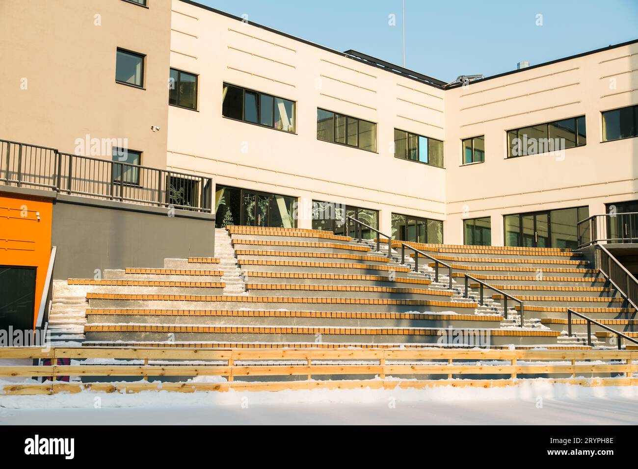 Facade of building with outdoor iron stairs. Industrial building ...