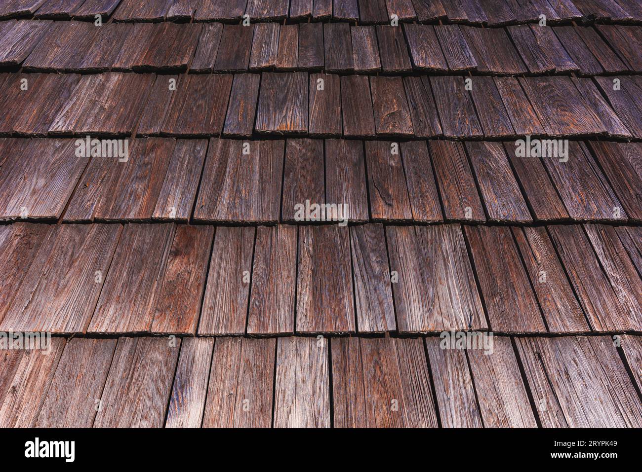Worn wooden roof tile pattern, detail of a typical old slovenian alpine ...