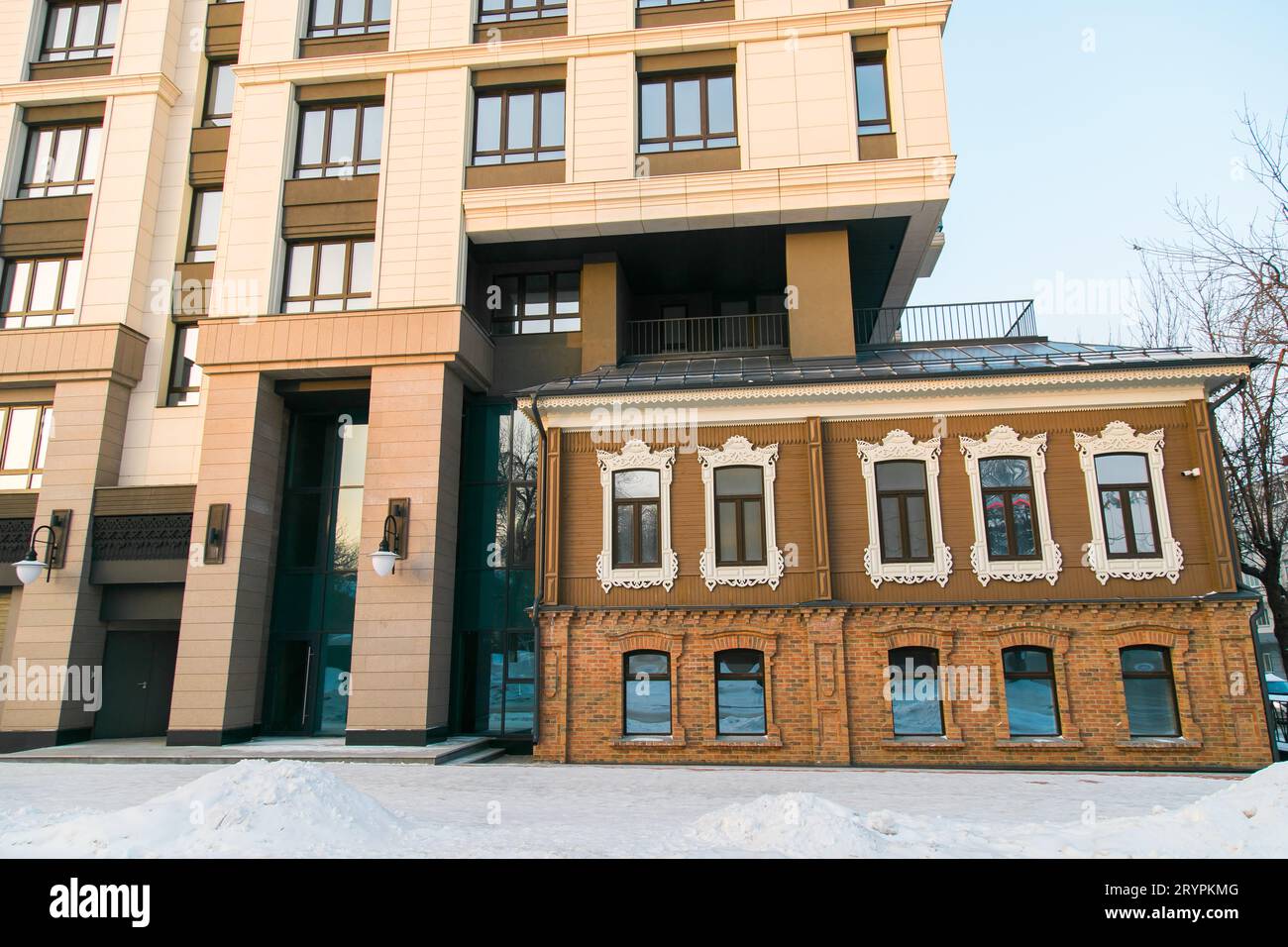 Two buildings in center of city in winter season with snow ...