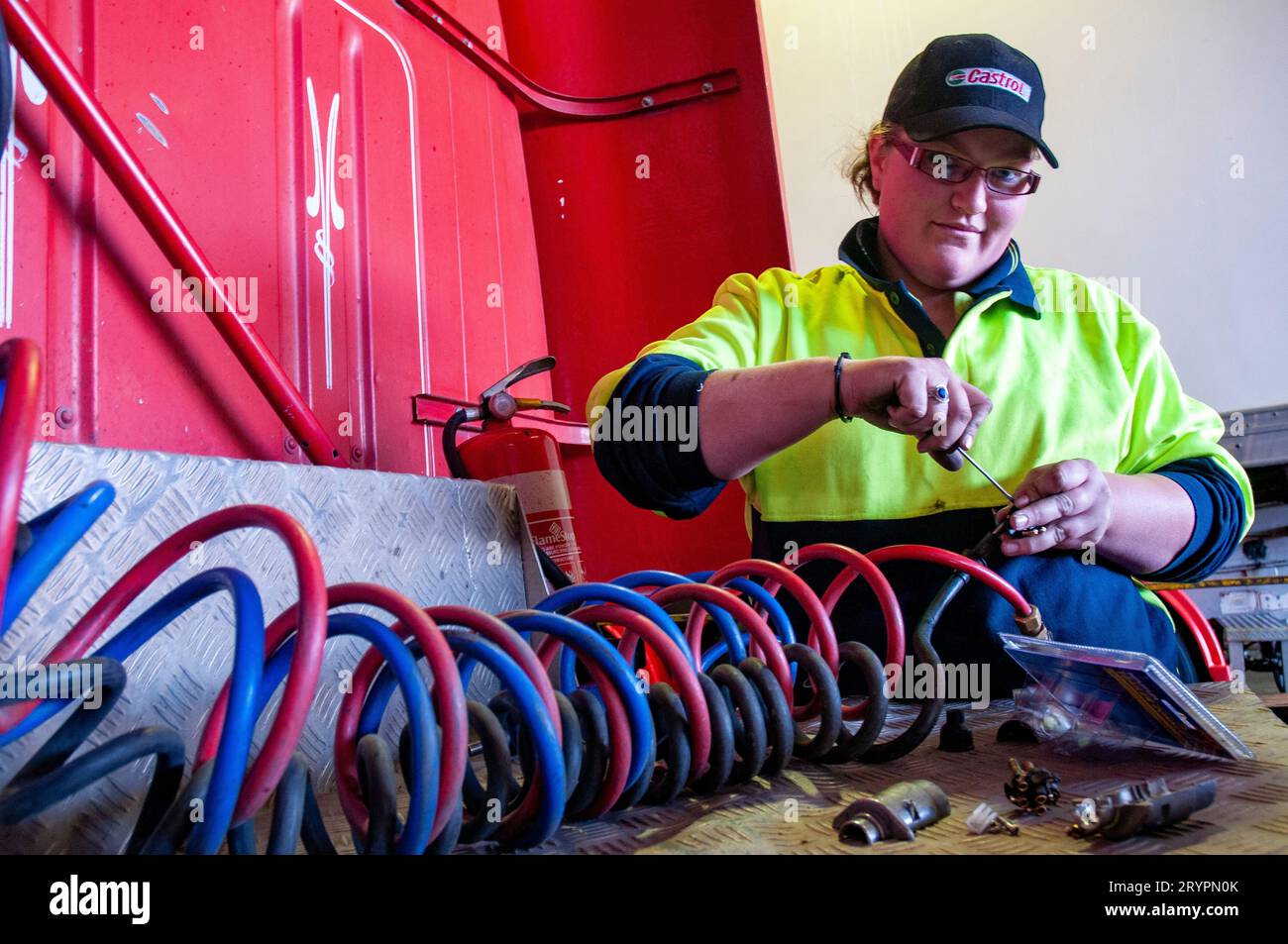 Breaking with tradition, a woman heavy vehicle motor mechanic in ...