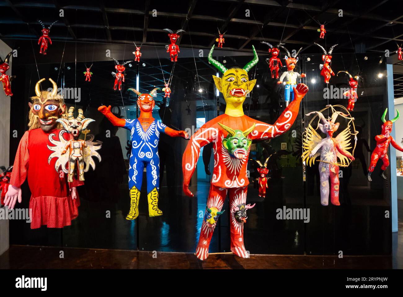 Mexico City, CDMX, Mexico, Figurines of red devils at Museo de Arte ...