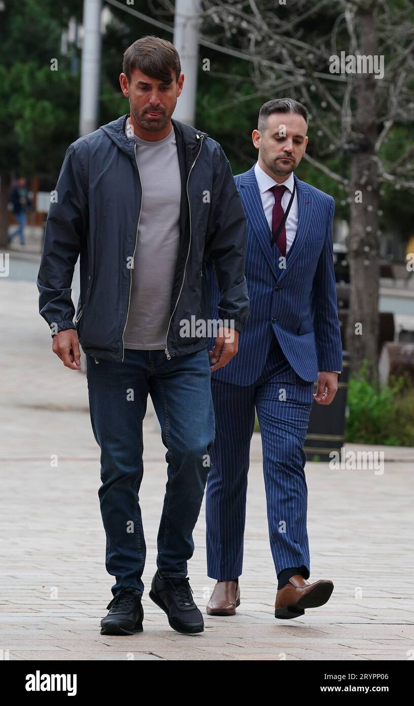 Steve Dunne (left) the father of Ashley Dale arriving at Liverpool ...