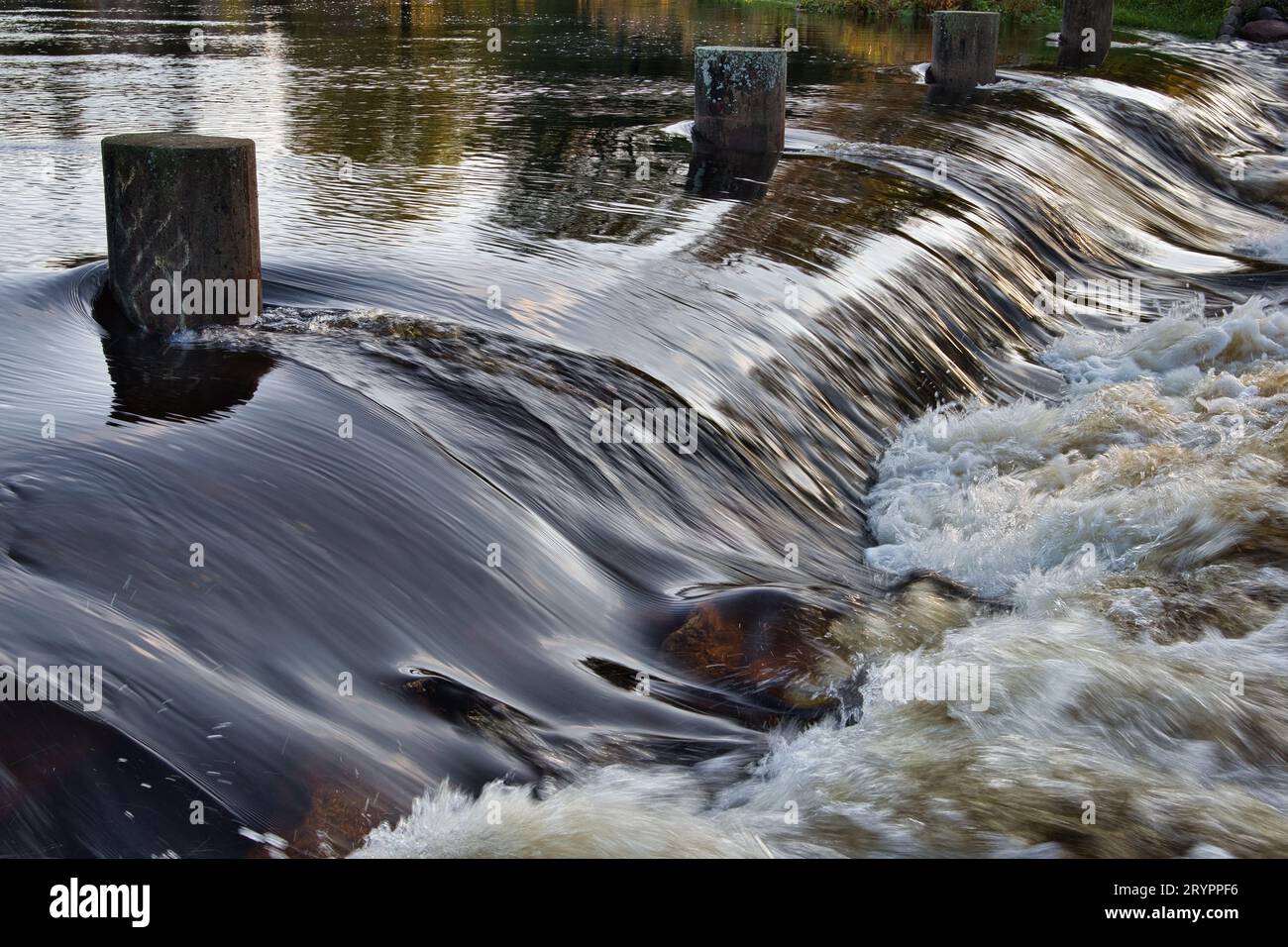 Water flowing over spillway hi-res stock photography and images - Alamy