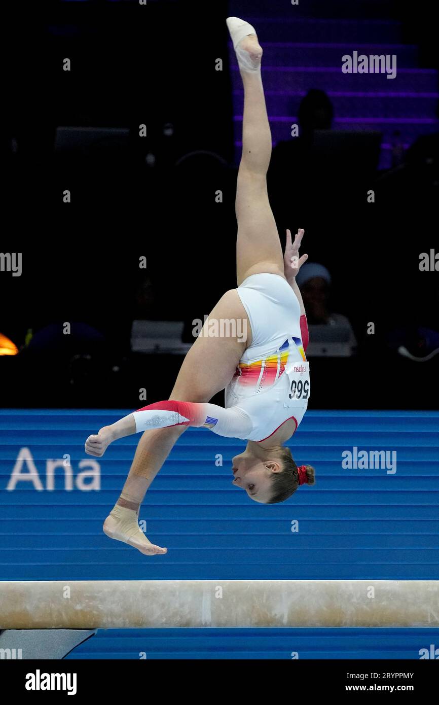 Romania's Ana Barbosu competes on the beam during Women's ...