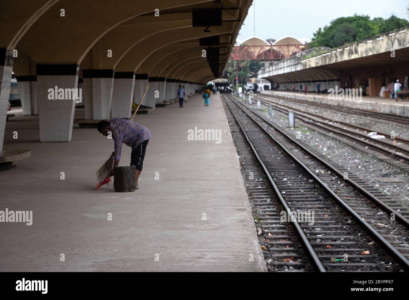 Dhaka, Dhaka, Bangladesh. 2nd Oct, 2023. A cleaner sweeps the floor at Kamalapur Railway Station ...