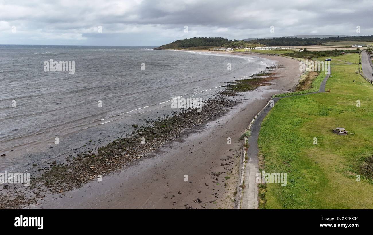 An aerial view of Maidens, Ayrshire, Scotland with a lush green grassy ...