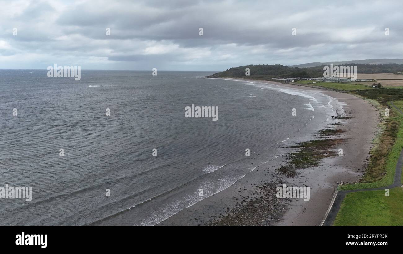 An aerial view of Maidens, Ayrshire, Scotland with a lush green grassy ...
