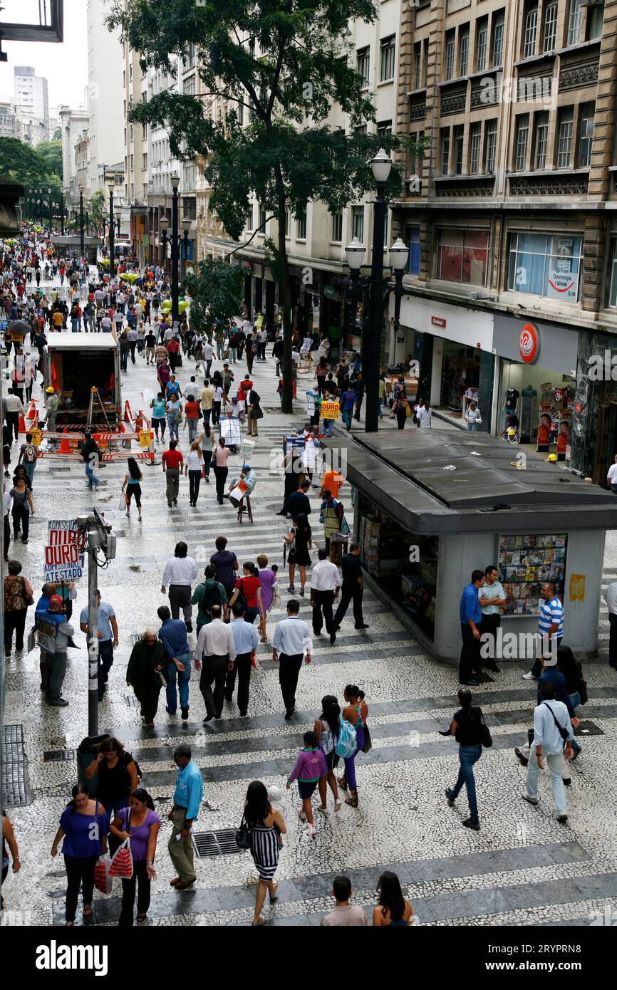People walking on a shopping pedestrian street in central Sao Paulo ...