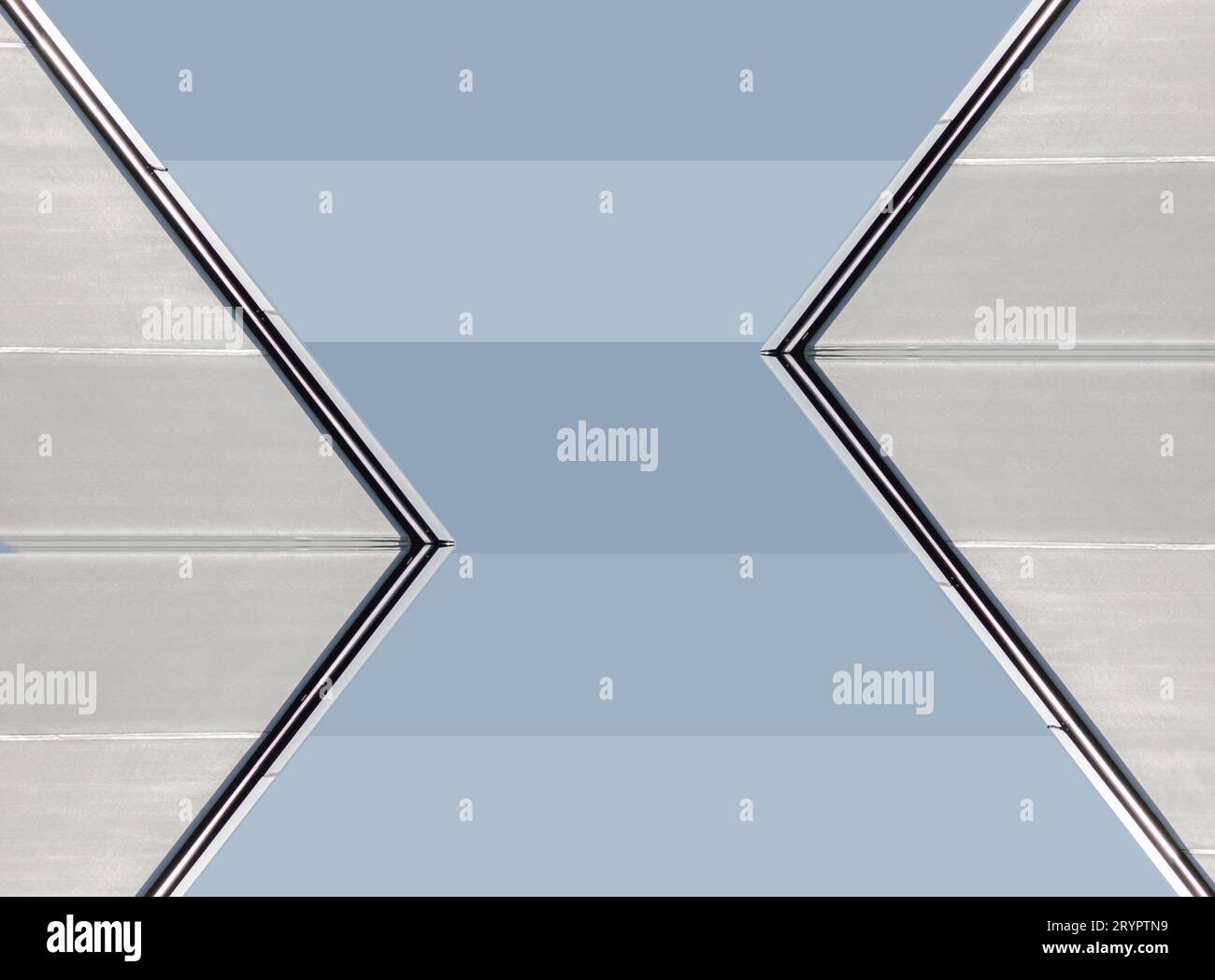 Corner of a gray concrete building with windows Stock Photo - Alamy