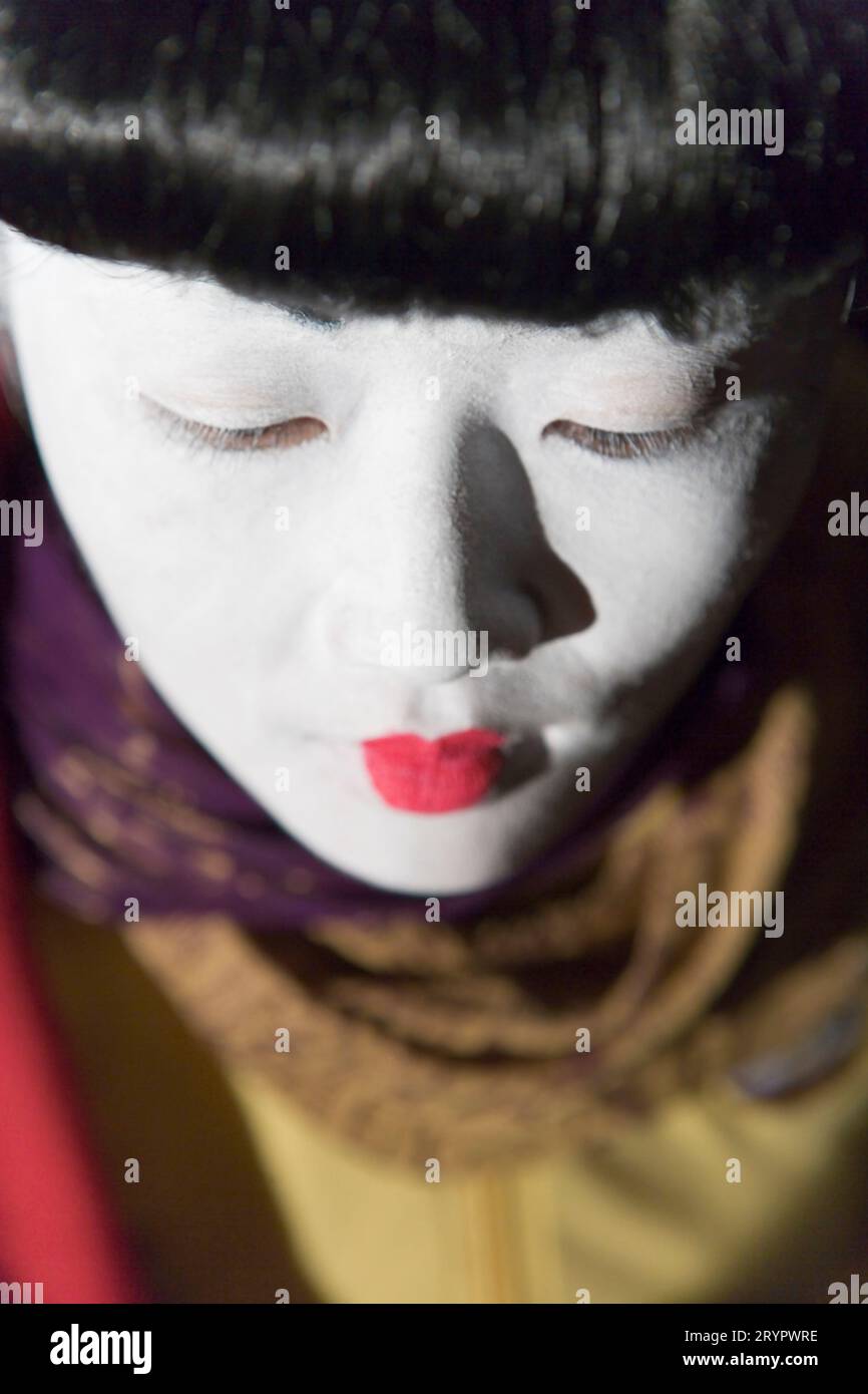 Portrait of Geisha at night, head only, top view, close up, looking ...