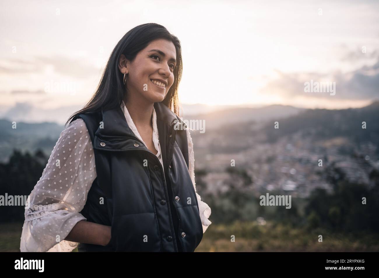 Casual and beauty latina women smiling outdoors at sunset Stock Photo - Alamy
