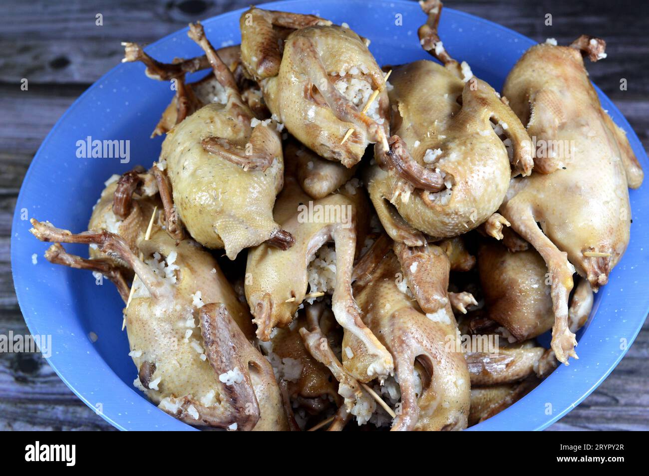 Boiled white rice stuffed pigeons or Hamam mahshi, boiled until cooked ...