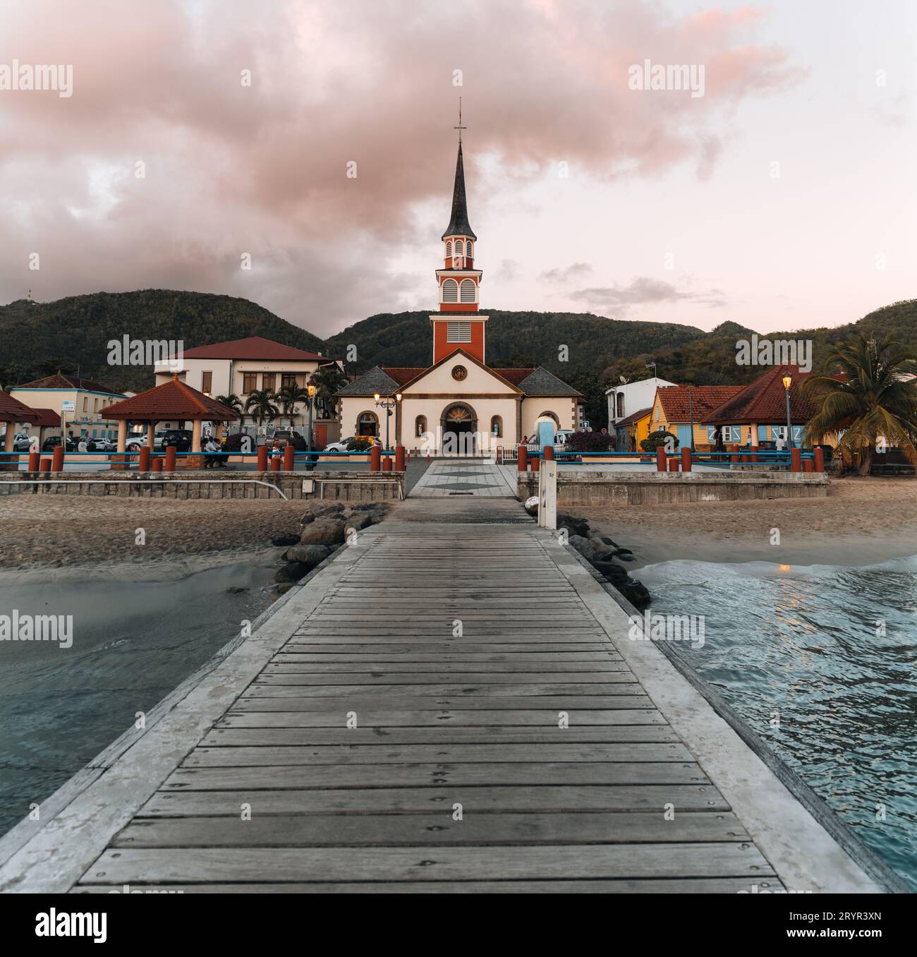 Long pier of the little town of Les Anses-d'Arlet, Martinique. Vibrant ...
