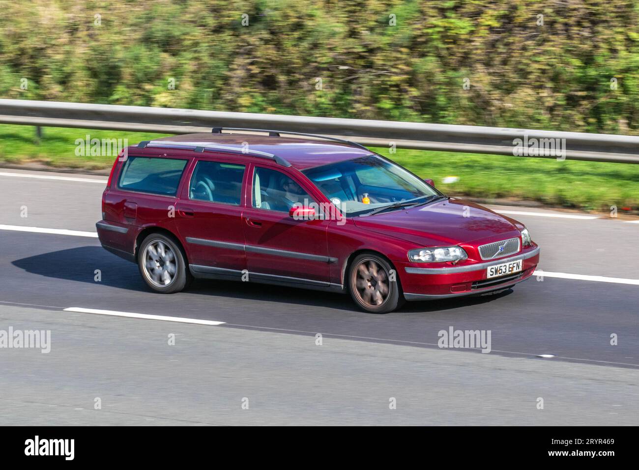 2003 Red Volvo V70 D5 S 2401 cc 5 speed manual travelling at speed on the M6 motorway in Greater ...