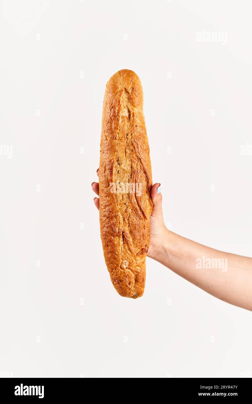 Baguette in hand hi-res stock photography and images - Alamy