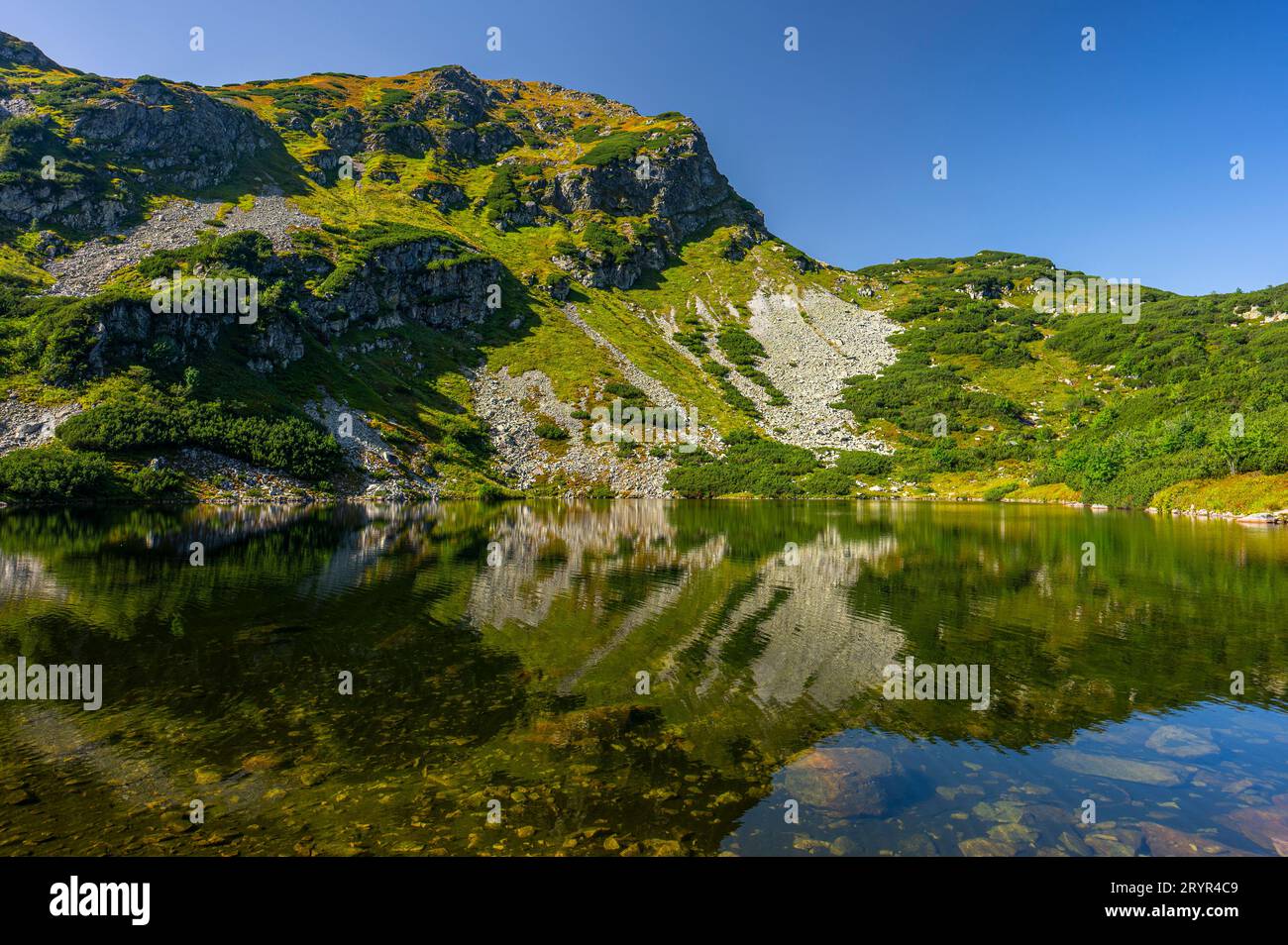An autumn view of the Rohace Mountain Lakes. Western tatras. One of the ...