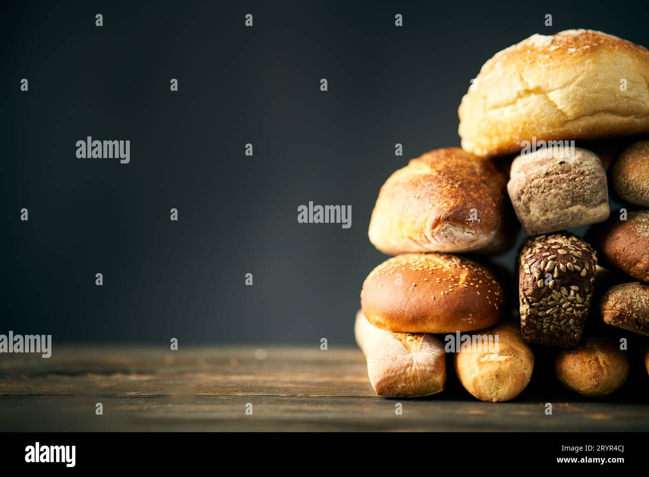 Different types of bread loaves close up with copy space Stock Photo ...