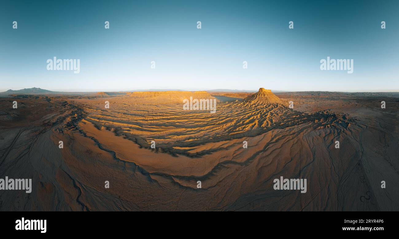 Factory Butte in the Caineville Badlands of Utah. Aerial drone panorama ...