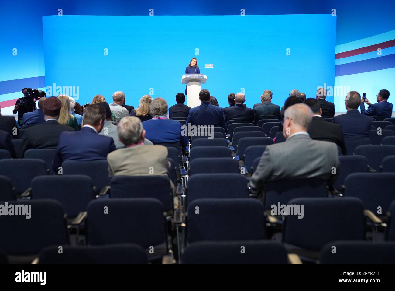 Empty seats in the auditorium during the speech by Lucy Frazer ...