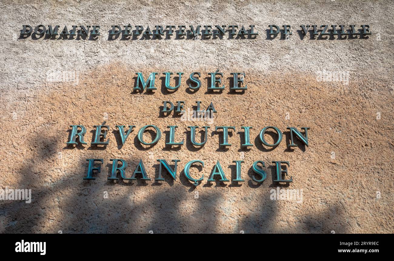 The museum sign on the wall outside the chateau which houses the Museum ...