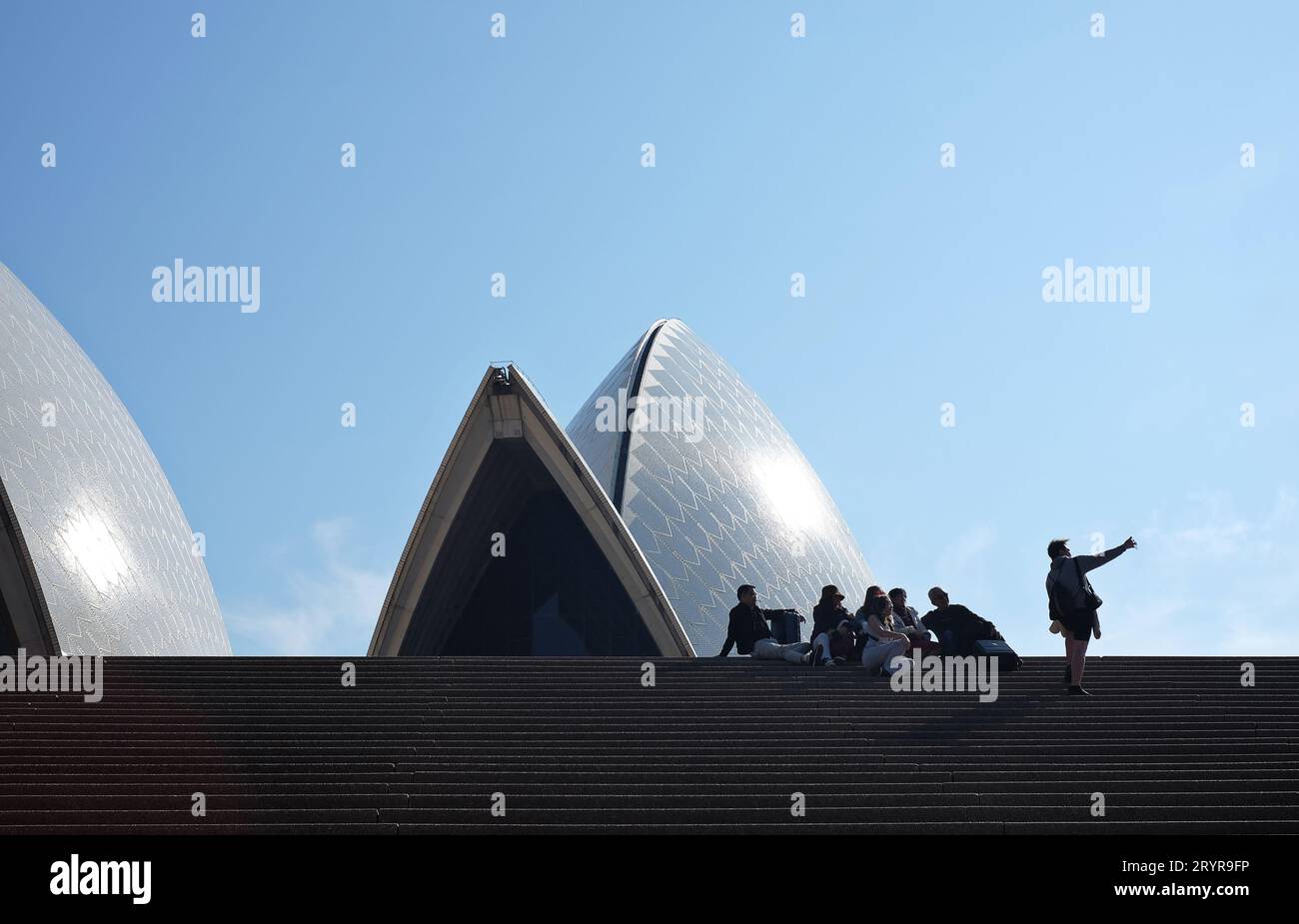A group selfie at the top of the Monumental Steps with the shells of ...