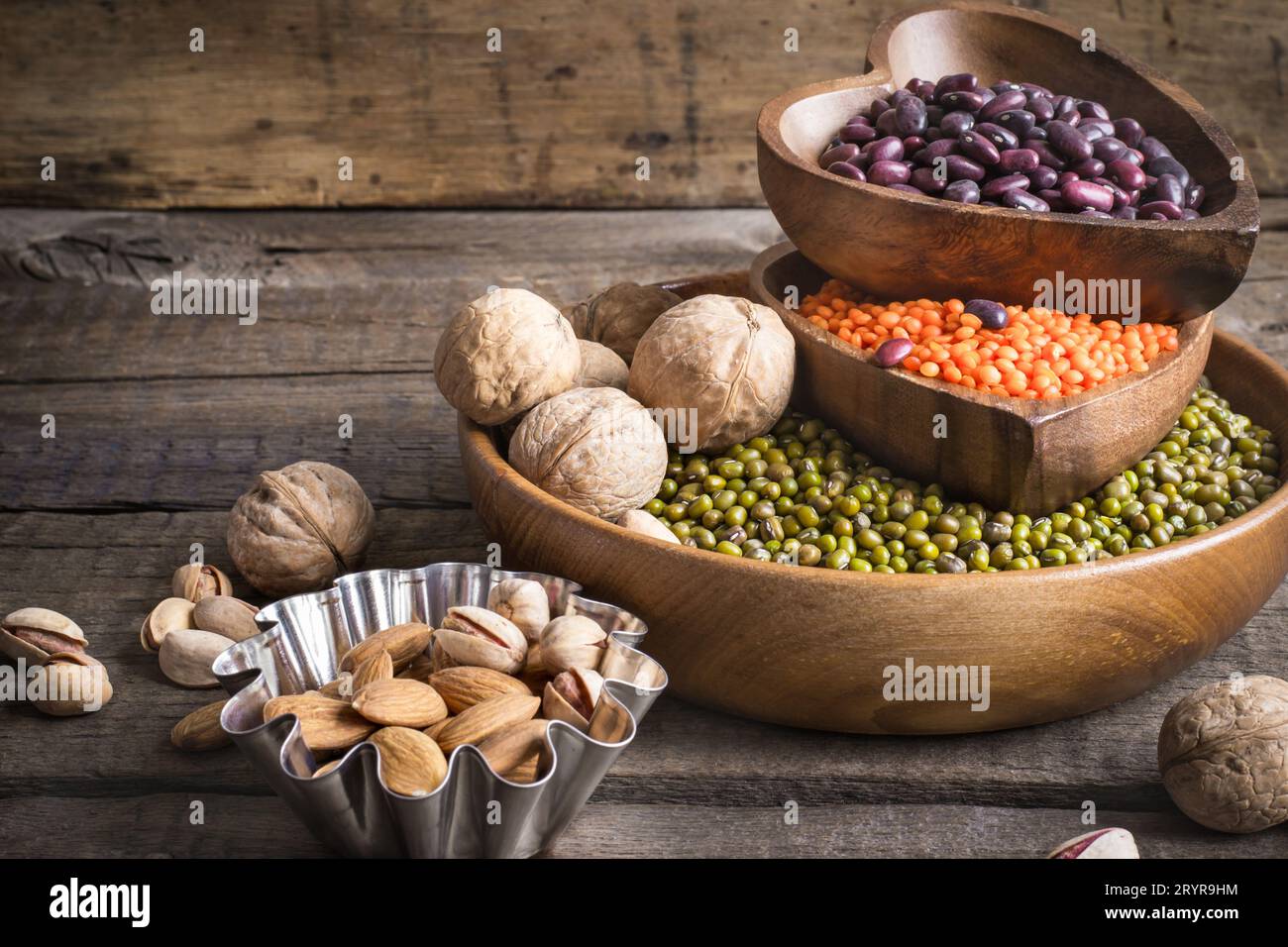 Sources of vegetable protein are various legumes and nuts Stock Photo ...