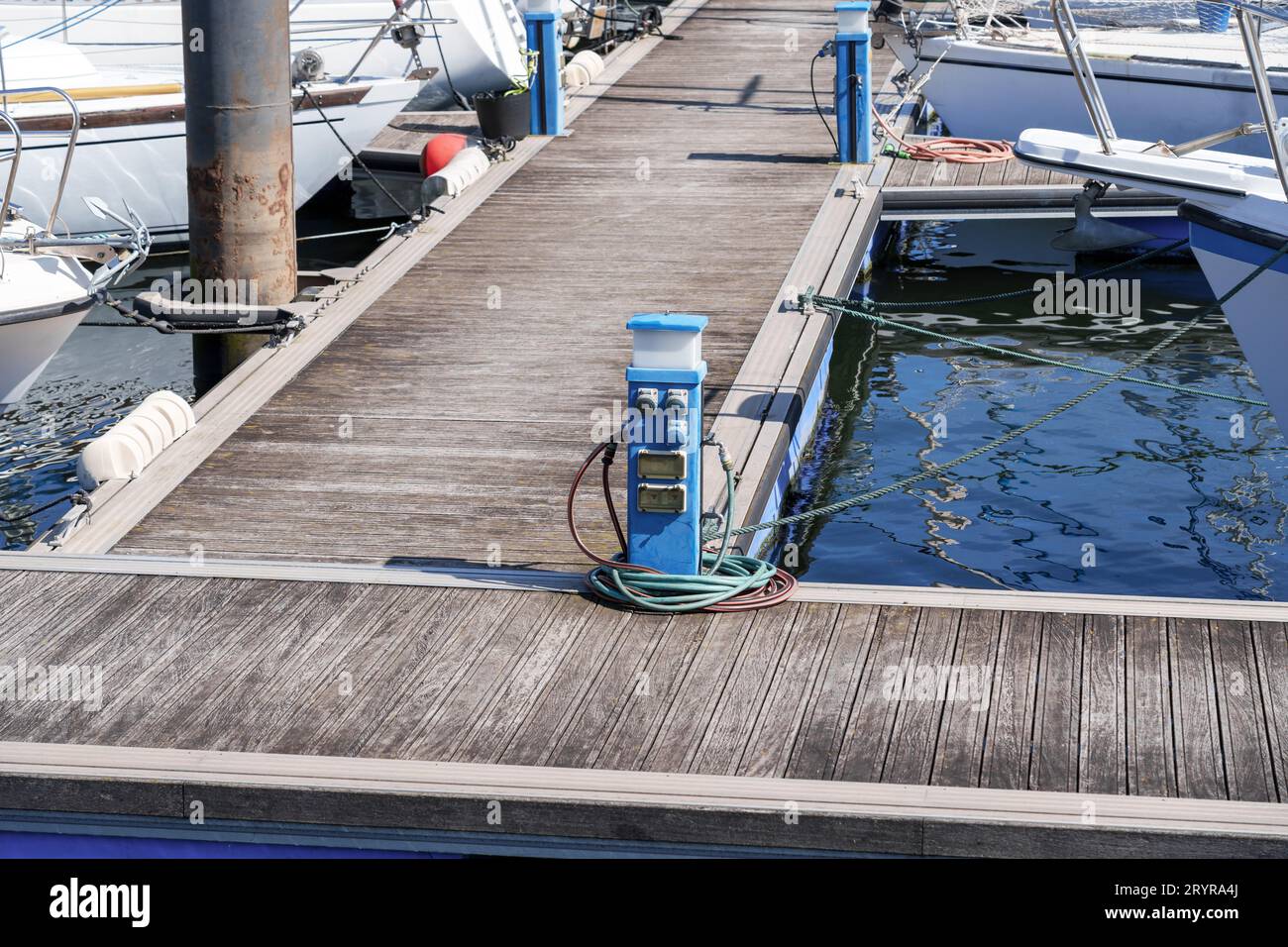 Charging station for boats in the harbor with electrical outlets Stock ...