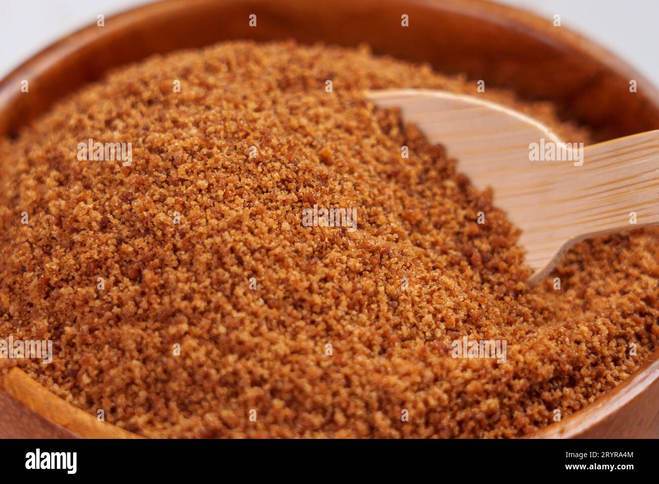 Full teaspoon of coconut sugar. Measuring unrefined sweet coco ...